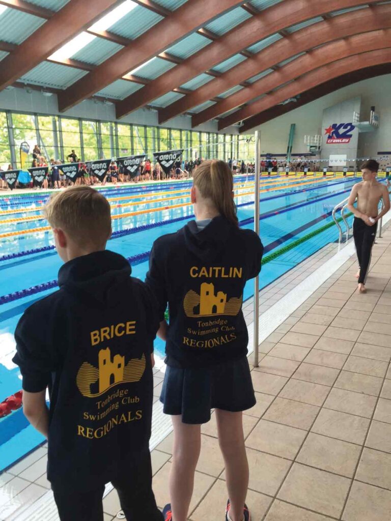 Town swimming duo compete against top talent at champs