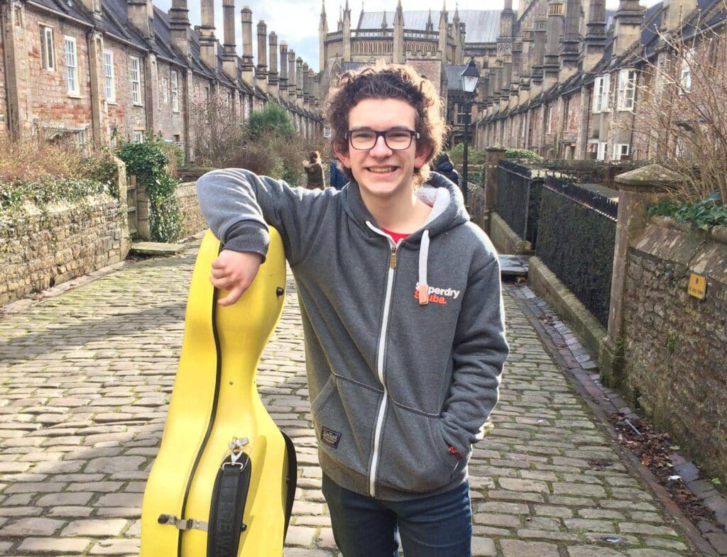Musical prodigy recruits his family for charity concert in his village